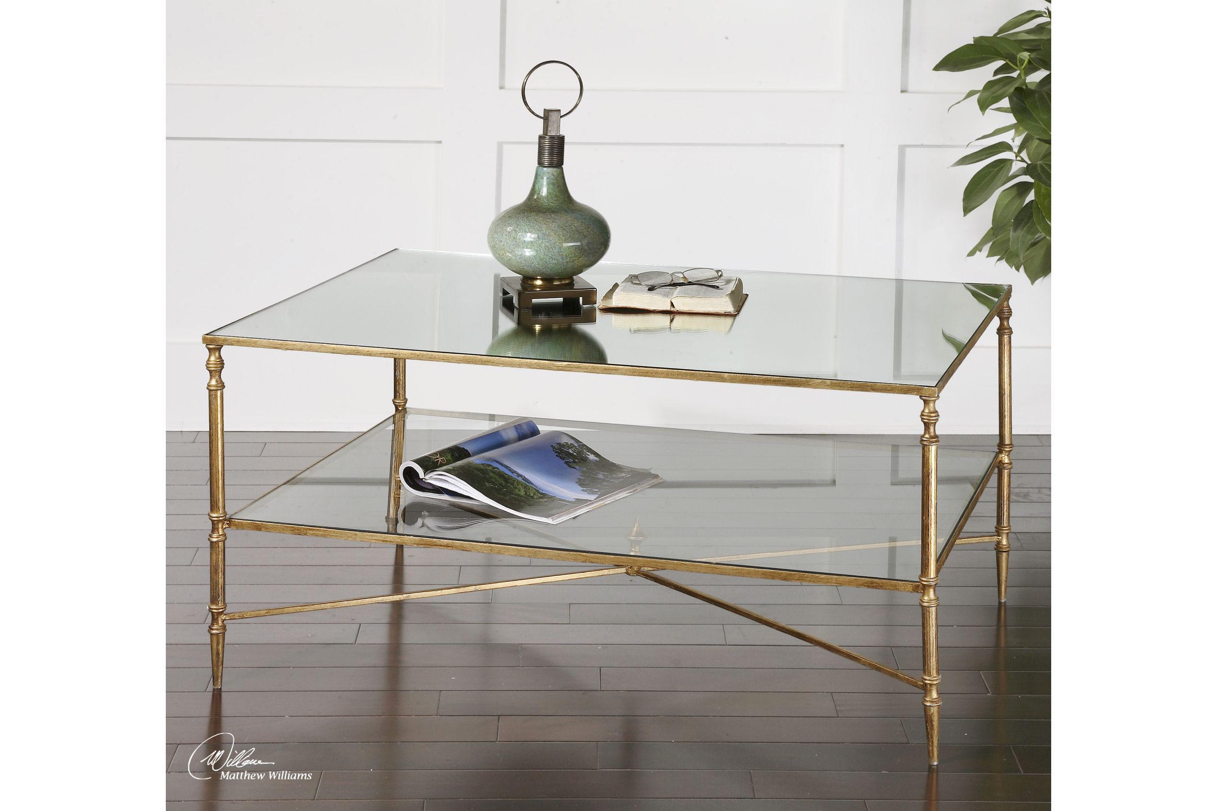 Henzler Mirrored Glass Coffee Table at Gardner-White